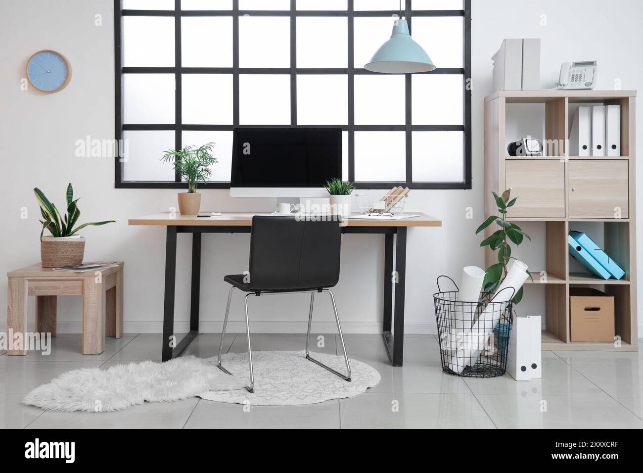 Interior of beautiful office with workplace, modern computer, shelving ...