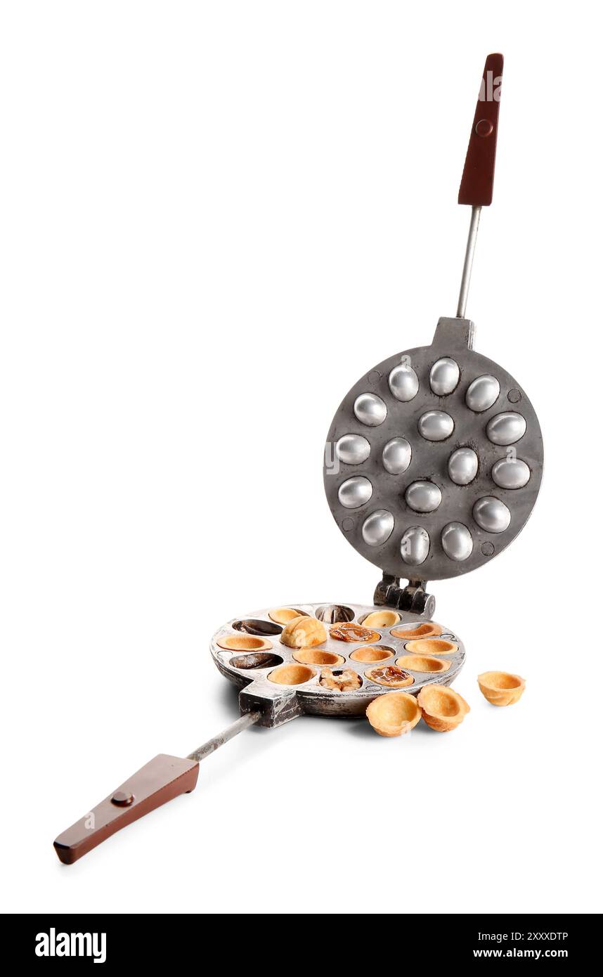 Baking form with tasty walnut shaped cookies on white background Stock ...