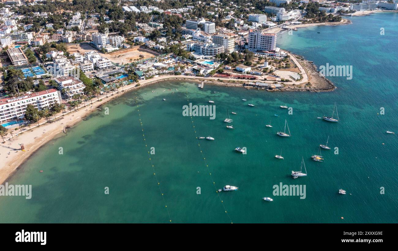 Aerial drone footage of a beach in the village of Sant Antoni on the ...