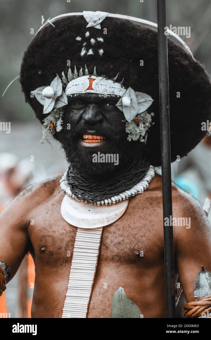 A Highlands warrior from Papua New Guinea, adorned in traditional ...