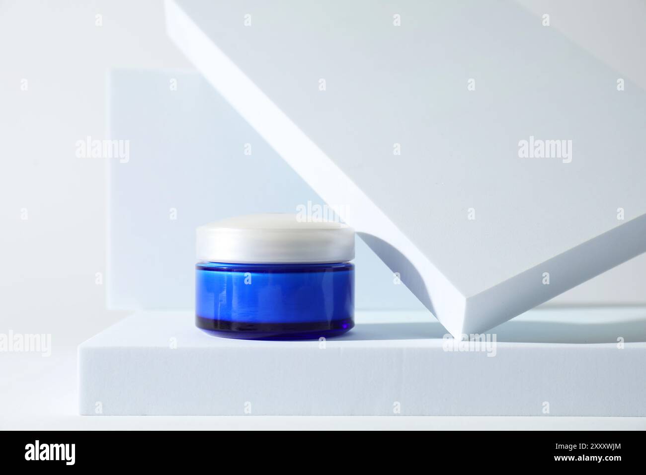 Stylish presentation of facial cream on white background Stock Photo ...