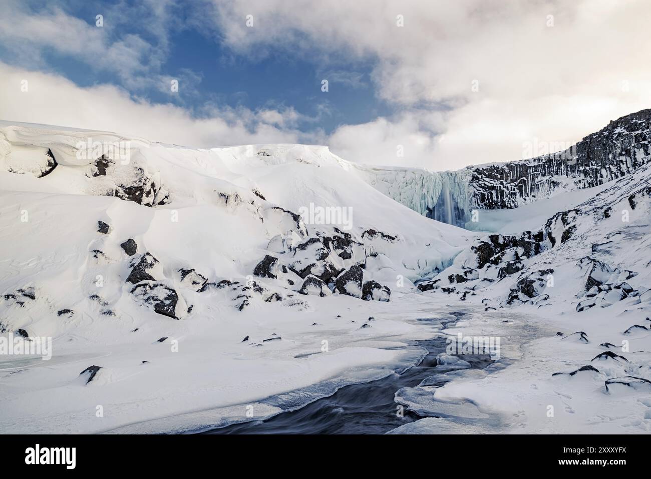 Iced Svodufoss waterfall in Snaefellsnes peninsula, Iceland, Europe ...