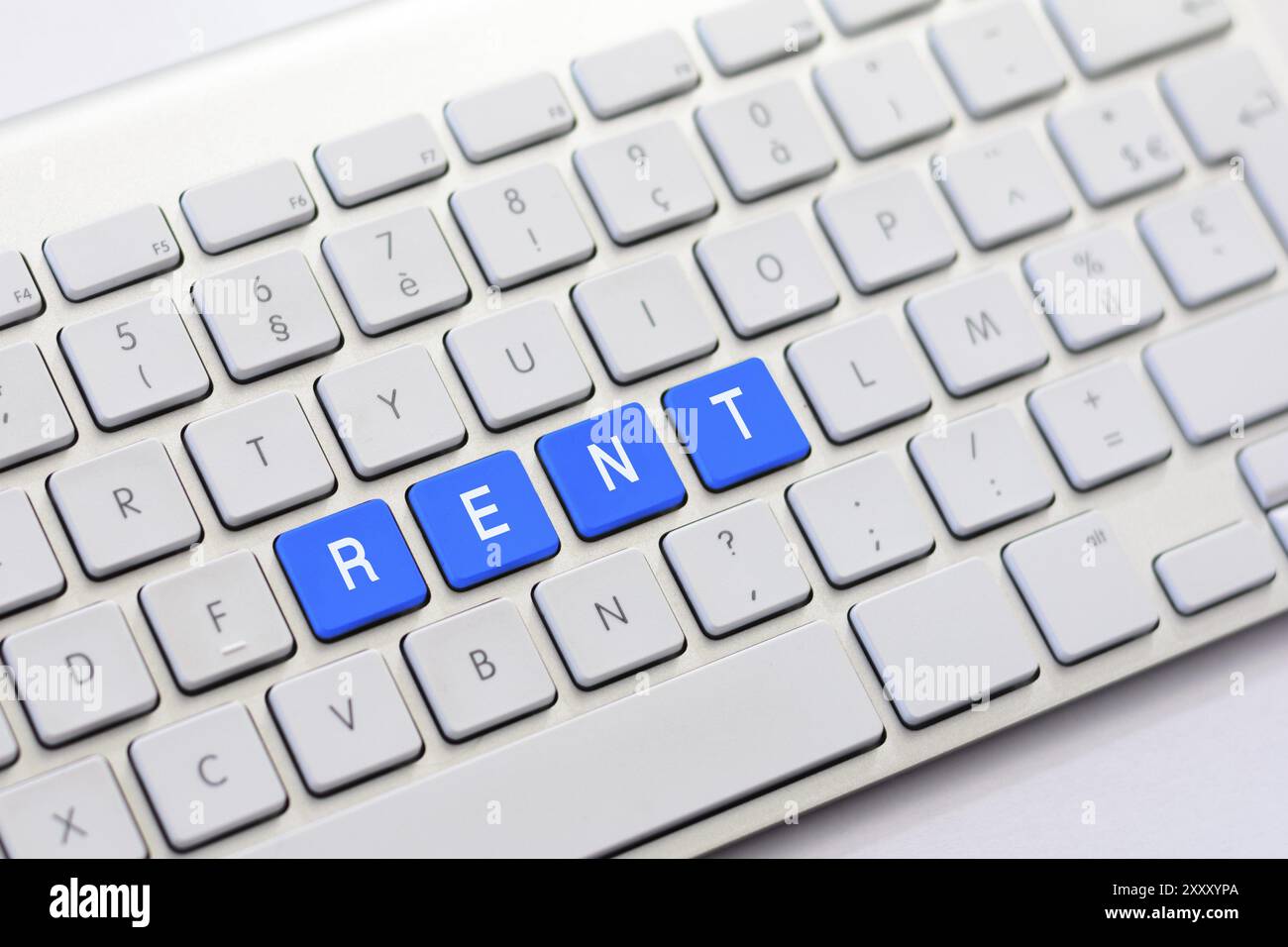 RENT writing on white keyboard Stock Photo - Alamy