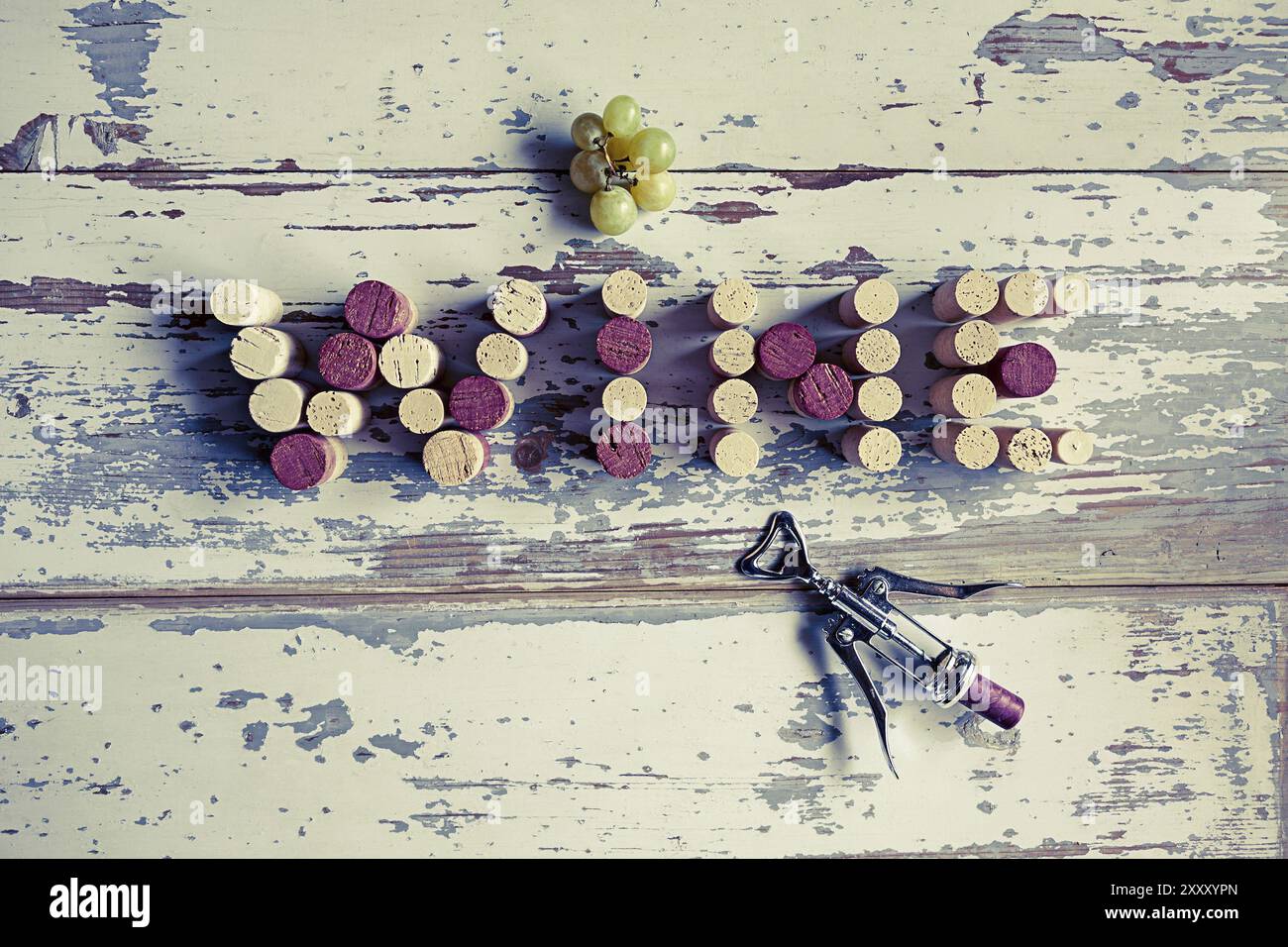 The word wine written with corks on a wood background Stock Photo - Alamy