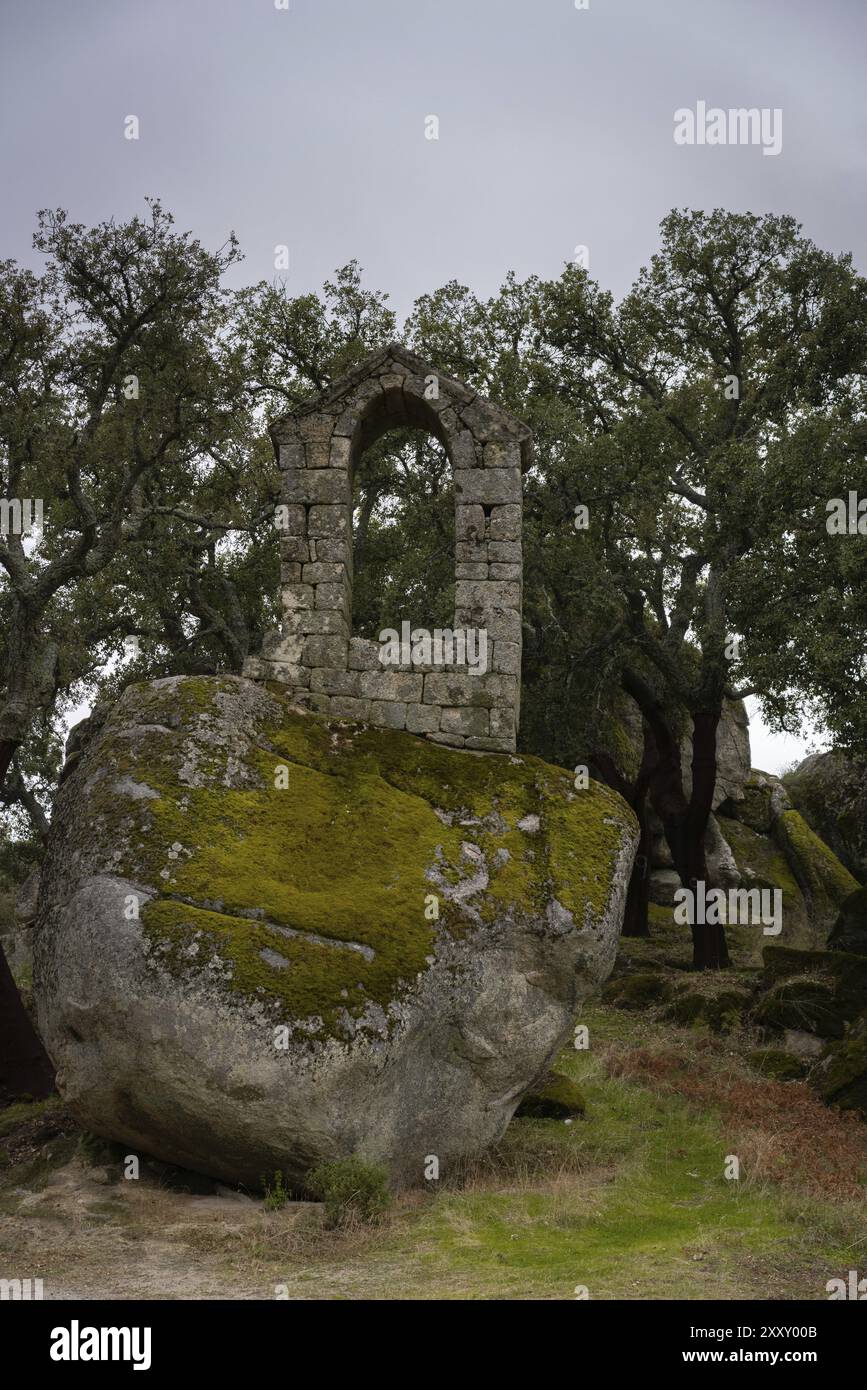 Ancient ruin stone structure building covered with moss near Sao Pedro ...
