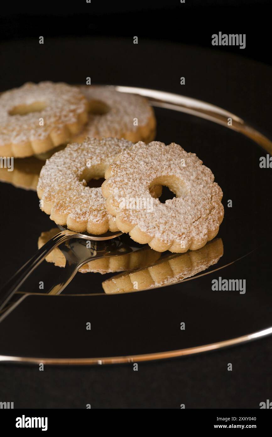 Biscuits on a silver plate Stock Photo - Alamy