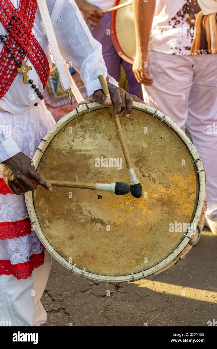 Drum player during a religious festival of Afro-Brazilian culture on ...