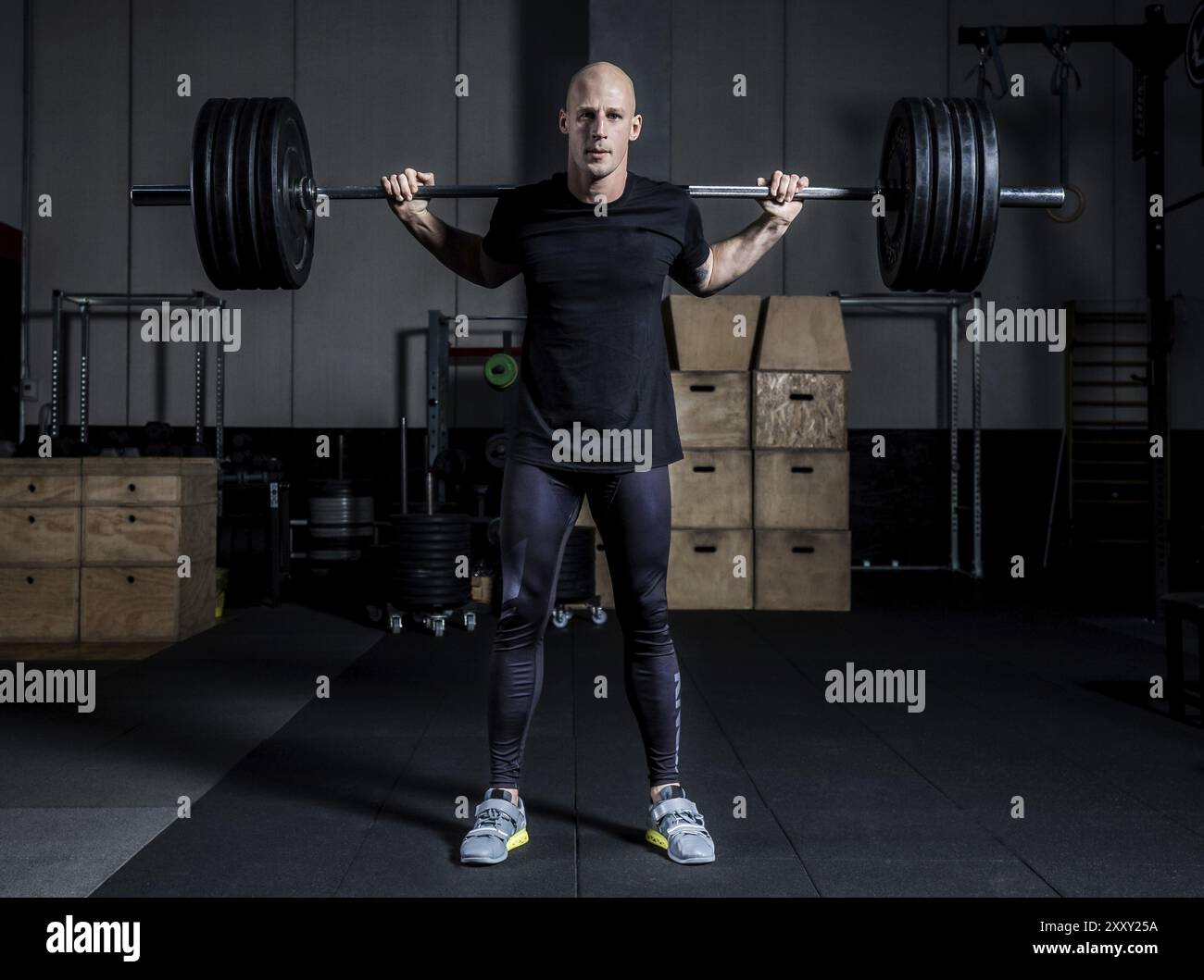 Athletic Muscular Man Holding Barbell On Your Shoulders In Gym ...