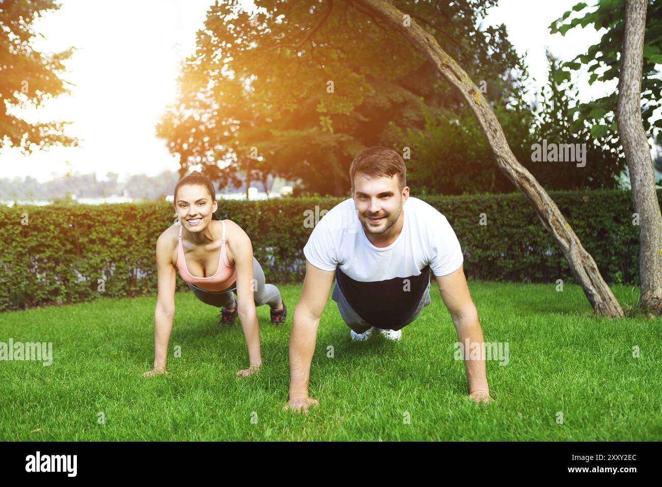 Young couple practice stretching together hi-res stock photography and ...