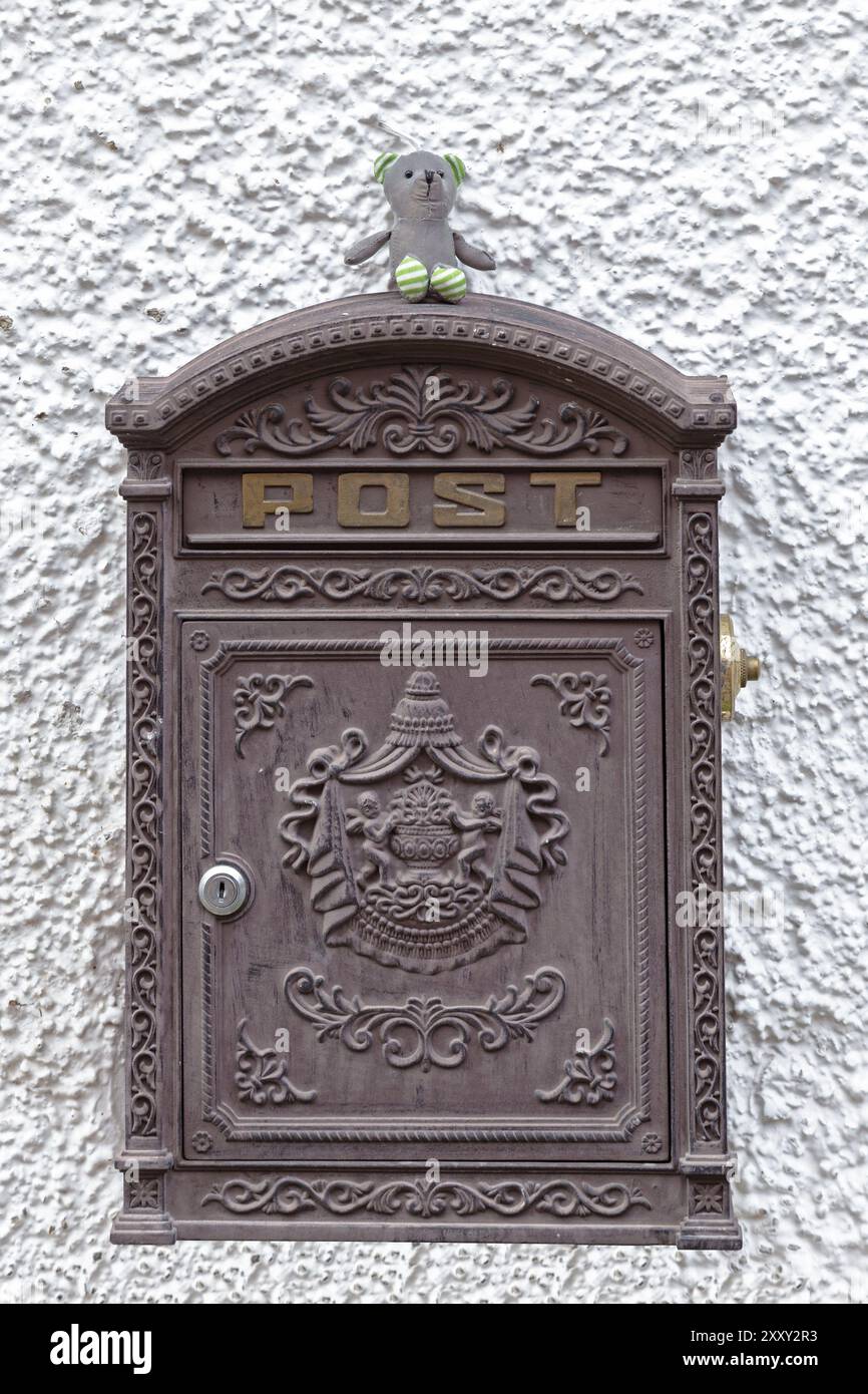 Beautiful old letterbox on a wall Stock Photo - Alamy