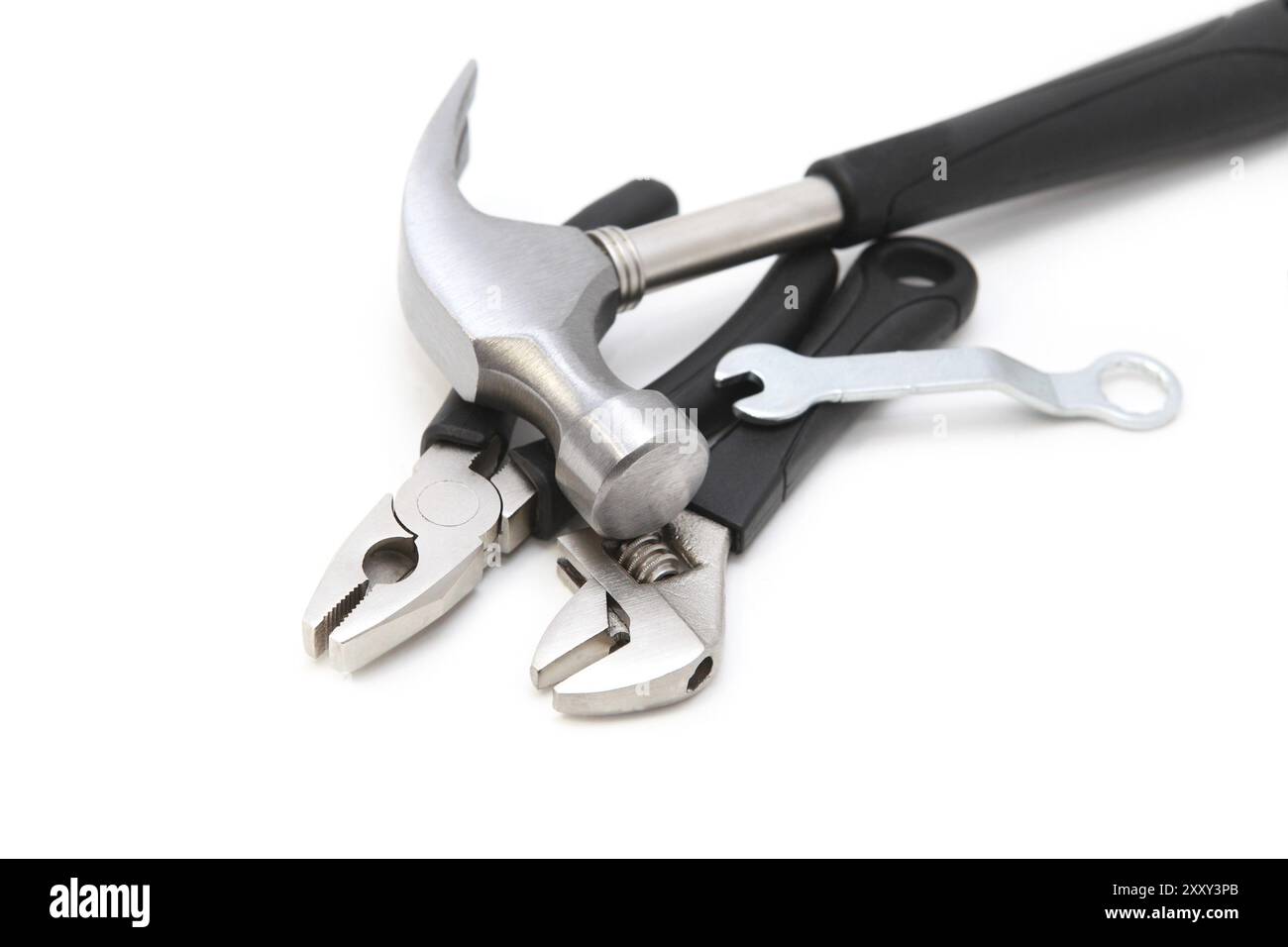 Working tools, pliers, key, hammer, wrench on white Stock Photo - Alamy