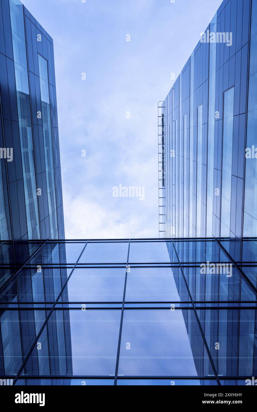 Reflections in glass facade of an office high rise Stock Photo - Alamy