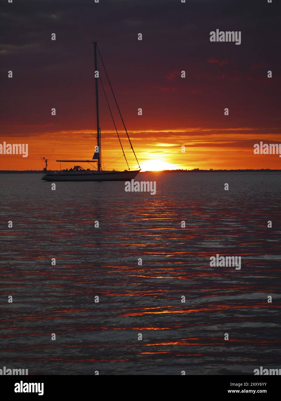 Sailboat at anchor Stock Photo - Alamy