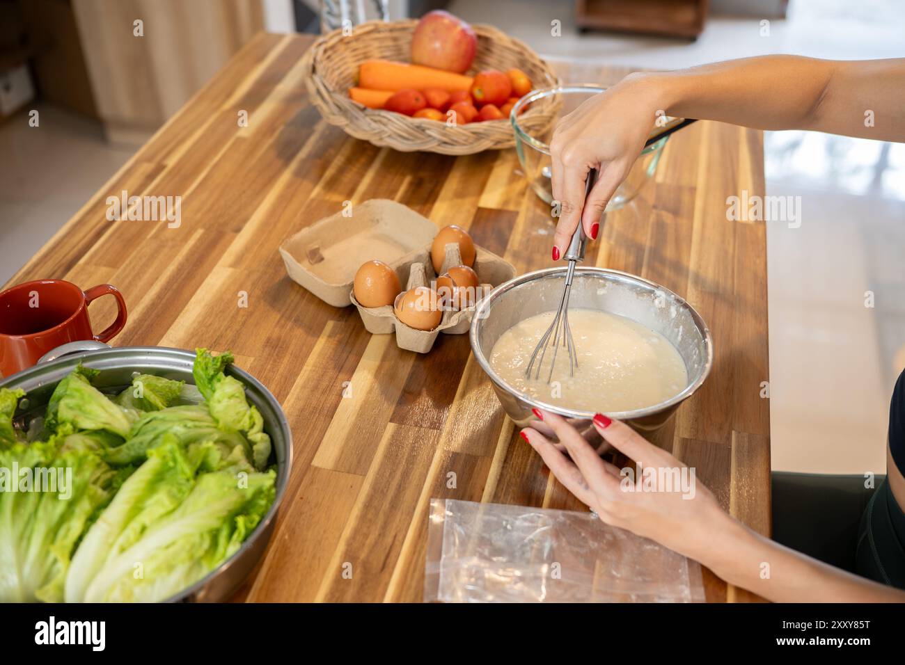 Asian woman whisking pancake hi-res stock photography and images - Alamy