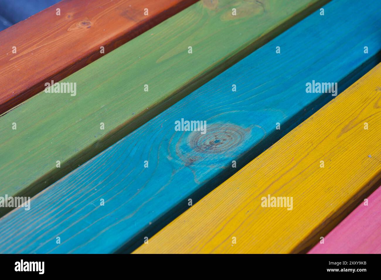 Rainbow wooden table outdoors with ashtray, hardwood and wood stain ...