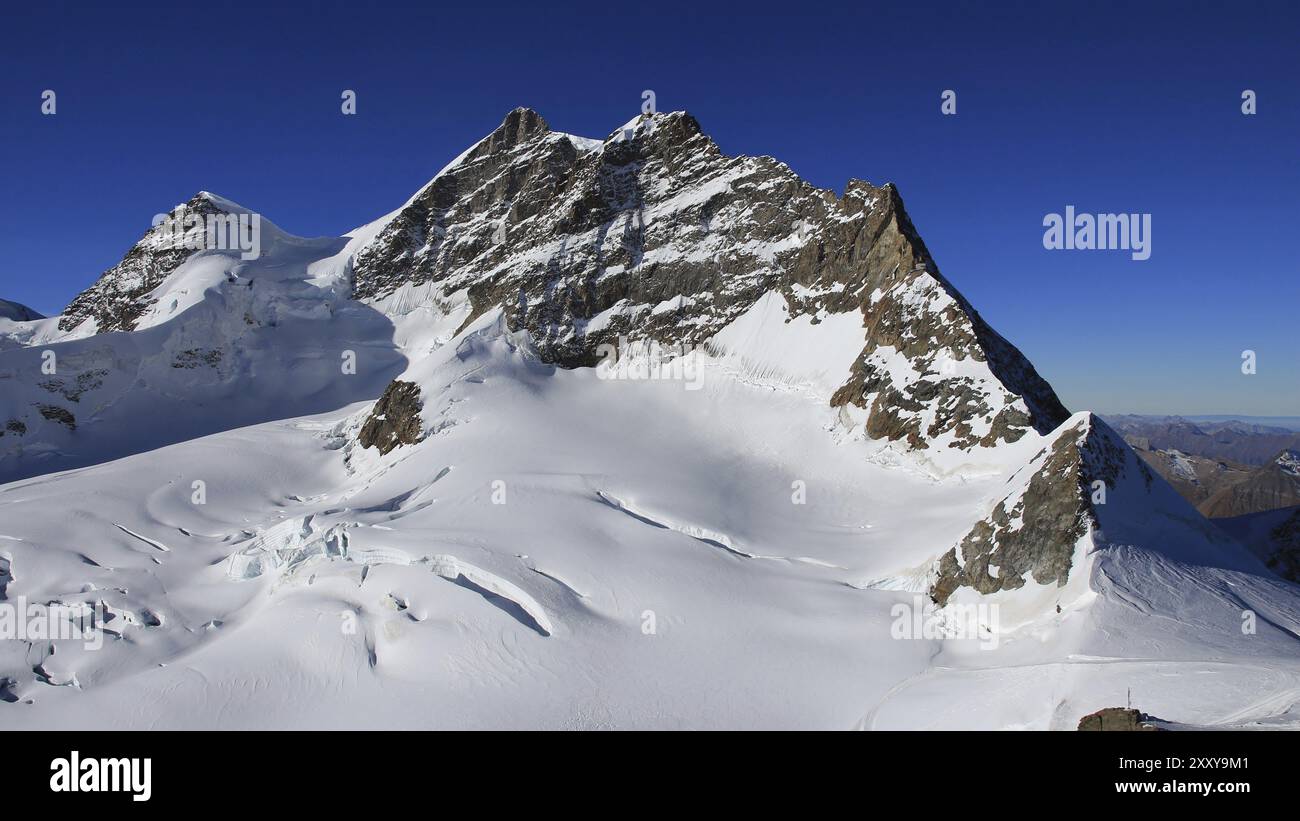 Famous mountain and glacier with crevasses Stock Photo - Alamy