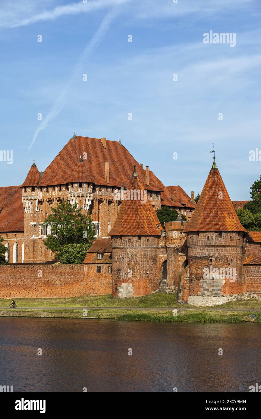 The Malbork Castle in Poland, medieval brick fortification at the Nogat ...