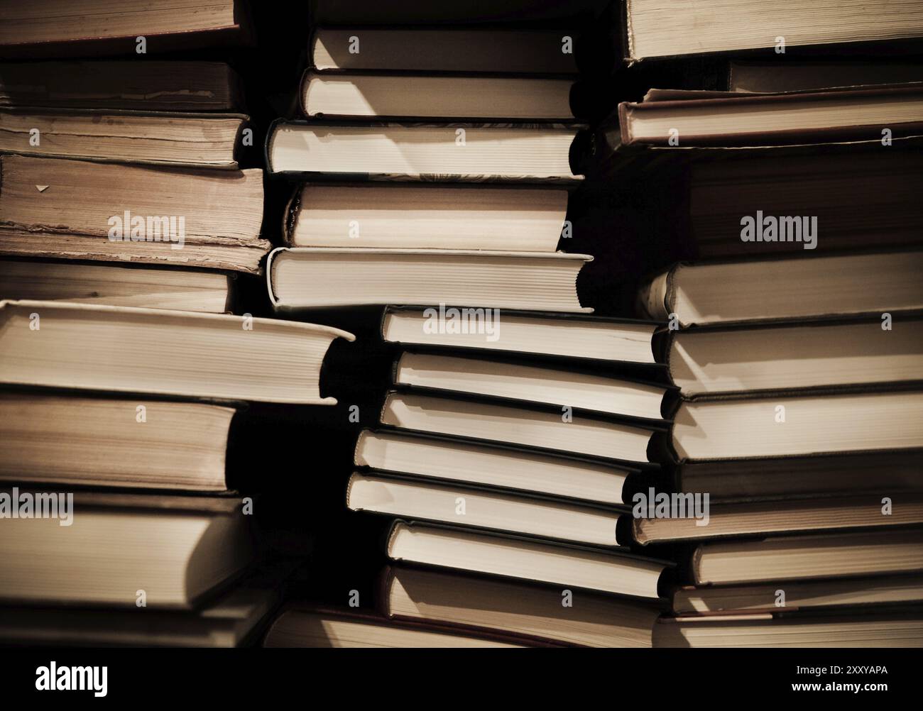 Pile of old dirty books on book shelf. Background Stock Photo - Alamy