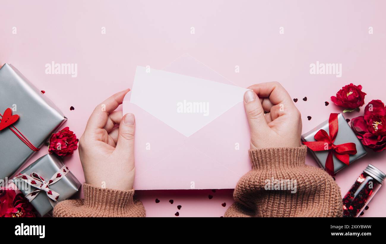 Female hands hold love letter empty message in open envelope, Valentine ...
