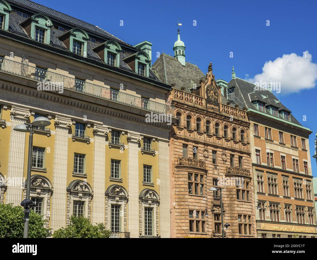 View of historic buildings with ornate facades and colourful roofs ...