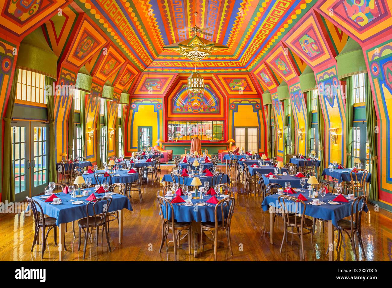 Colorful grand dining hall of Naniboujou Lodge looking toward front ...