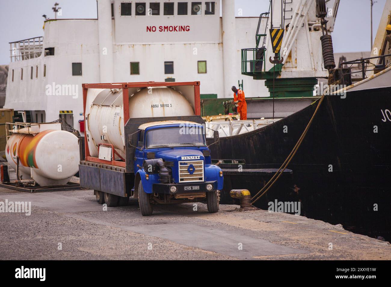 Blue lorry with tank next to a ferry Stock Photo - Alamy