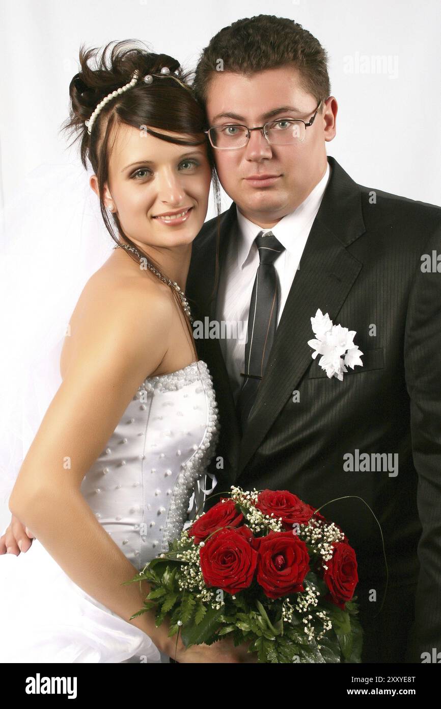 Newly married together in a photo pose Stock Photo - Alamy