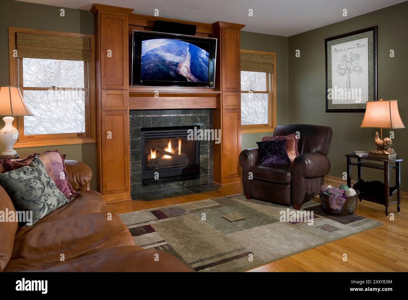 Family room with custom built fireplace mantel that accommodates ...