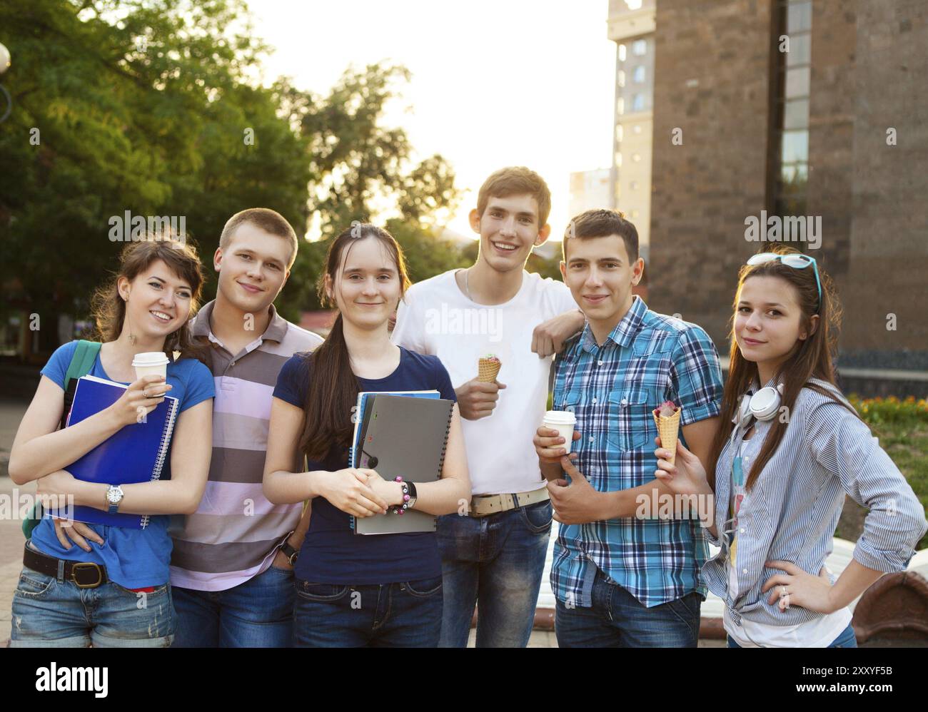 Group of college students during a brake between classes, chatting ...