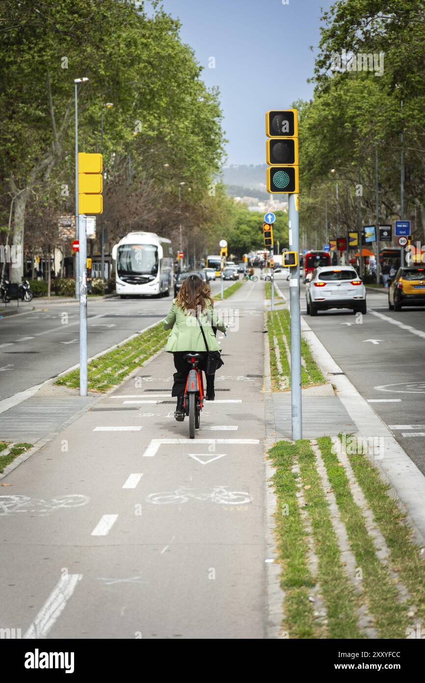 Two-lane cycle path in the centre of a four-lane road in Barcelona ...