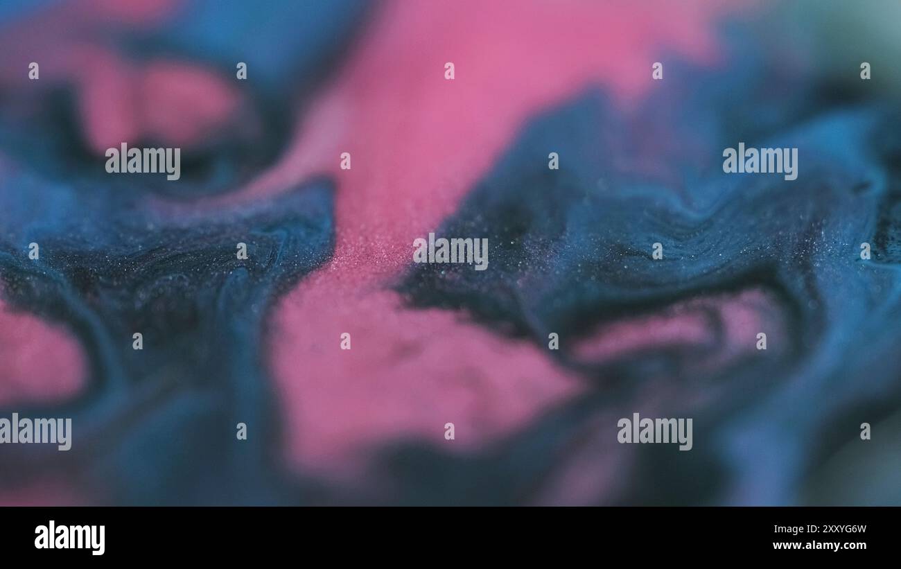 Bokeh sparkles. Fluid spill. Blur pink blue black color shimmering texture layers wave flow ...
