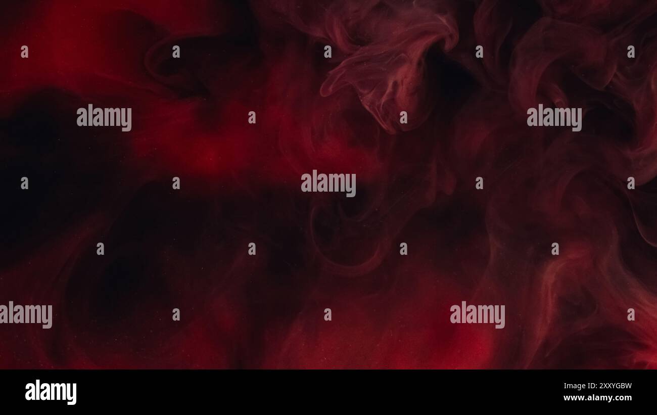 Explosion smog. Paint water splash. Defocused black red color glitter ...