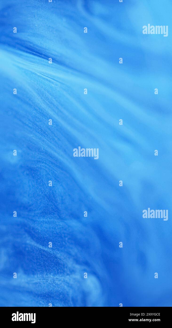 Paint spill. Fluid art. Defocused blue color sparkling glitter texture ...