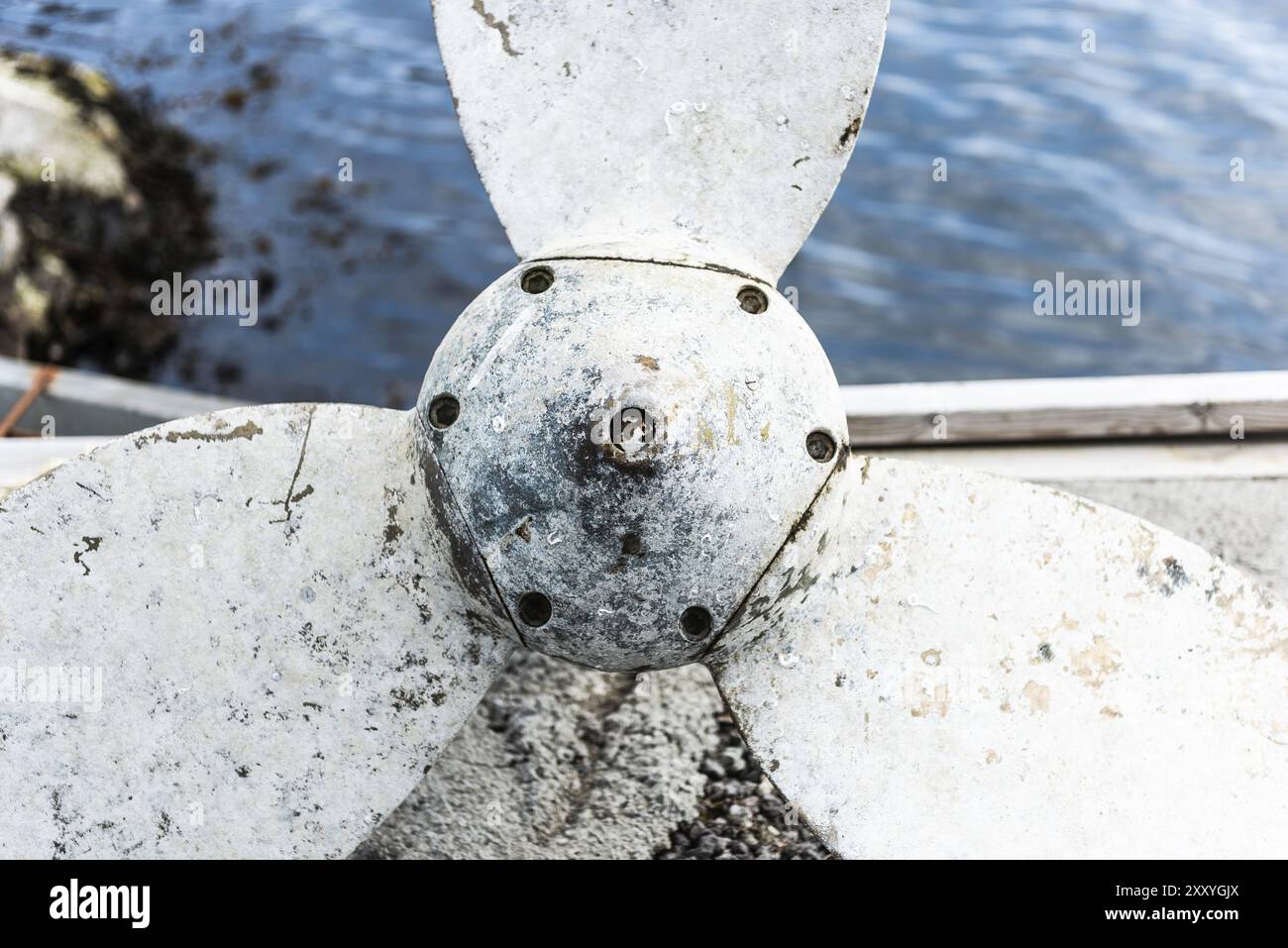 Old and corroded metal propeller of a fishing boat Stock Photo - Alamy
