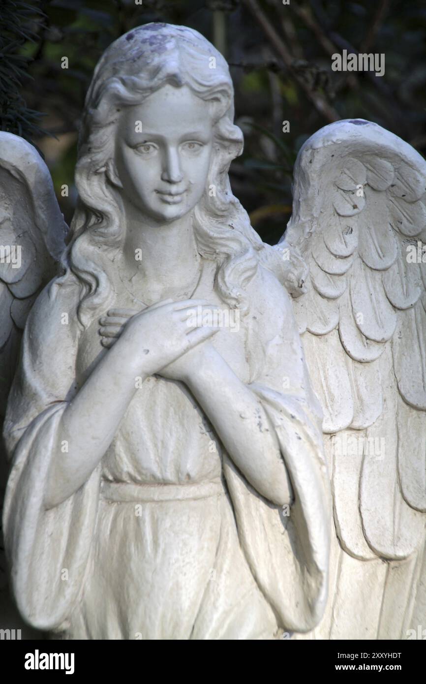 Angel on a grave Stock Photo - Alamy