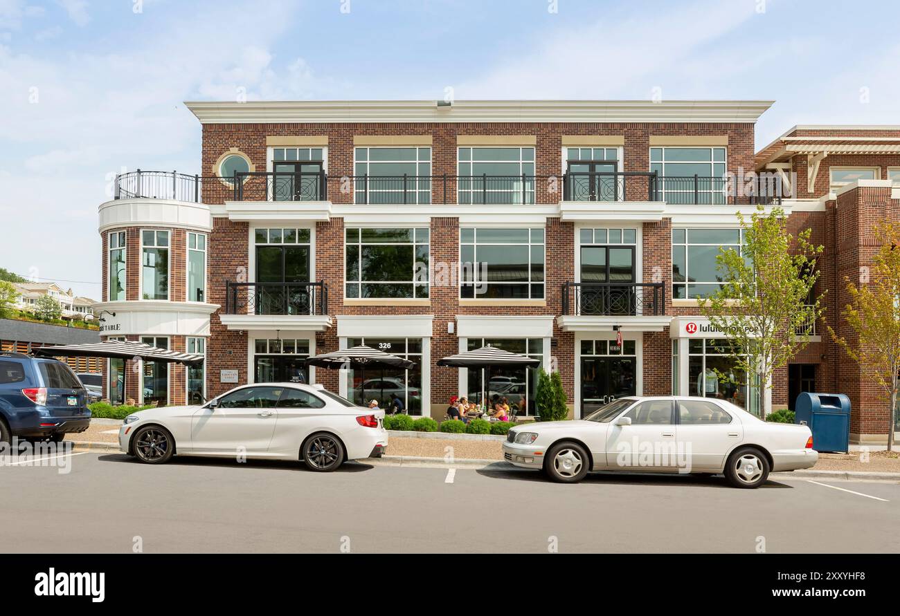 Exterior of new mixed use brick building with black and white accents ...