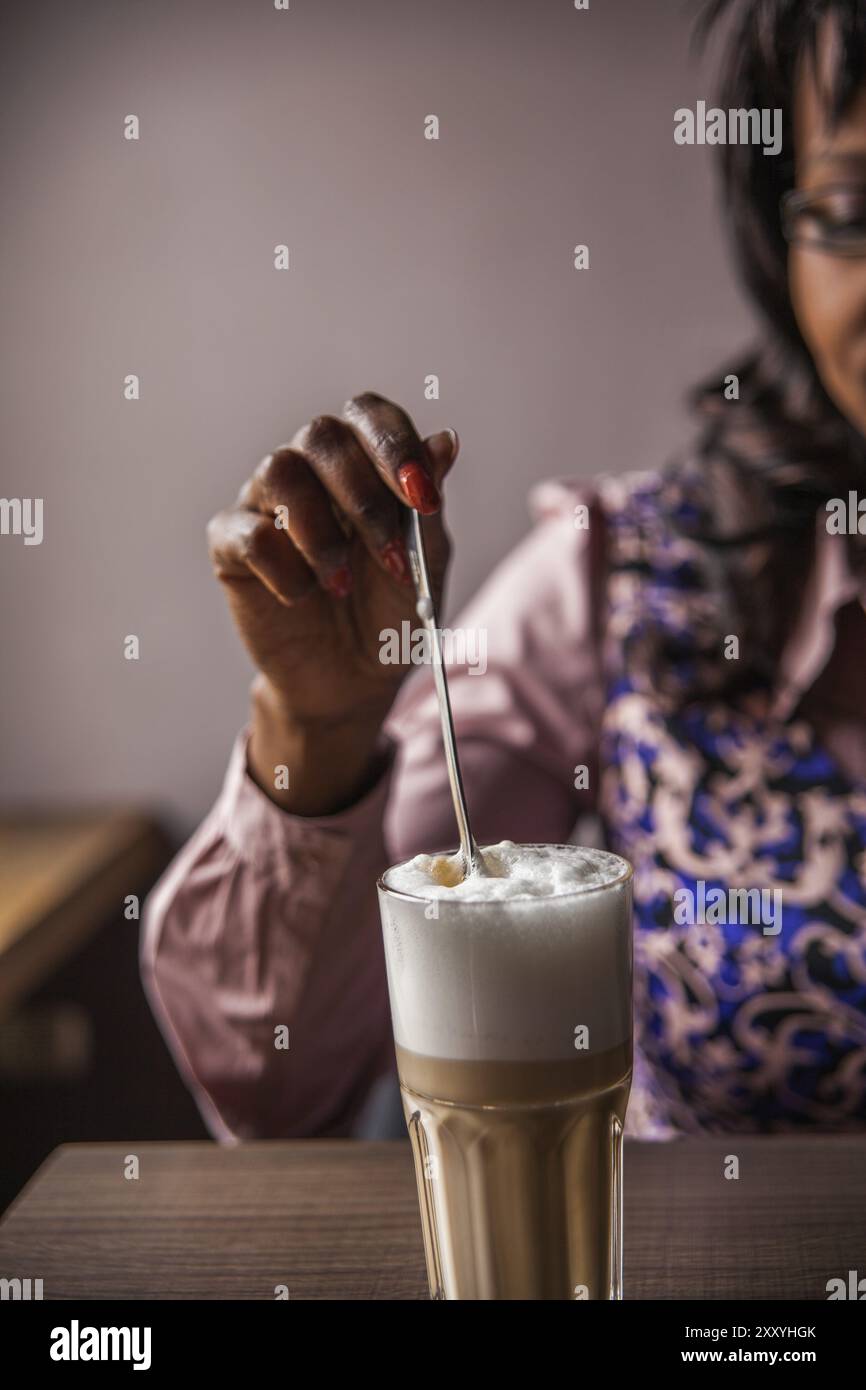 Woman stirs hi-res stock photography and images - Alamy