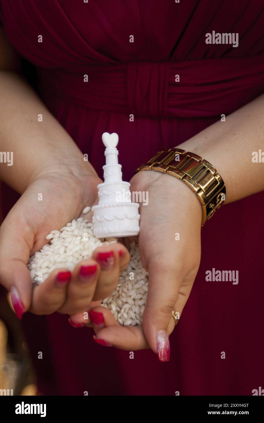 Woman holding rice in her cupped hands Stock Photo - Alamy