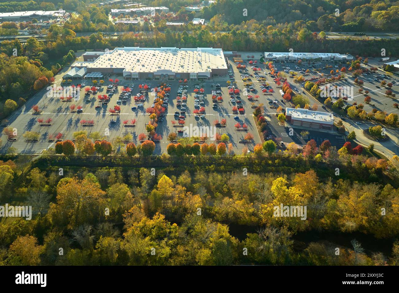 Aerial view grocery shopping mall and many colorful cars parked on ...