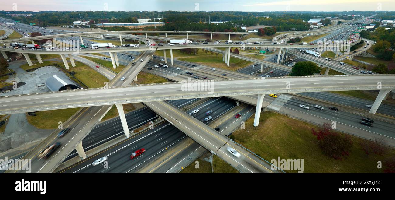 Aerial view of american freeway intersection with fast moving cars and ...