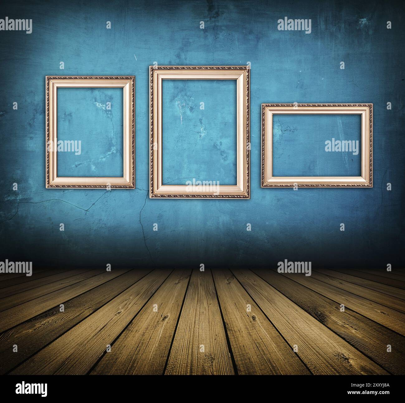 Dark vintage blue room with wooden floor and and emty frames on the ...