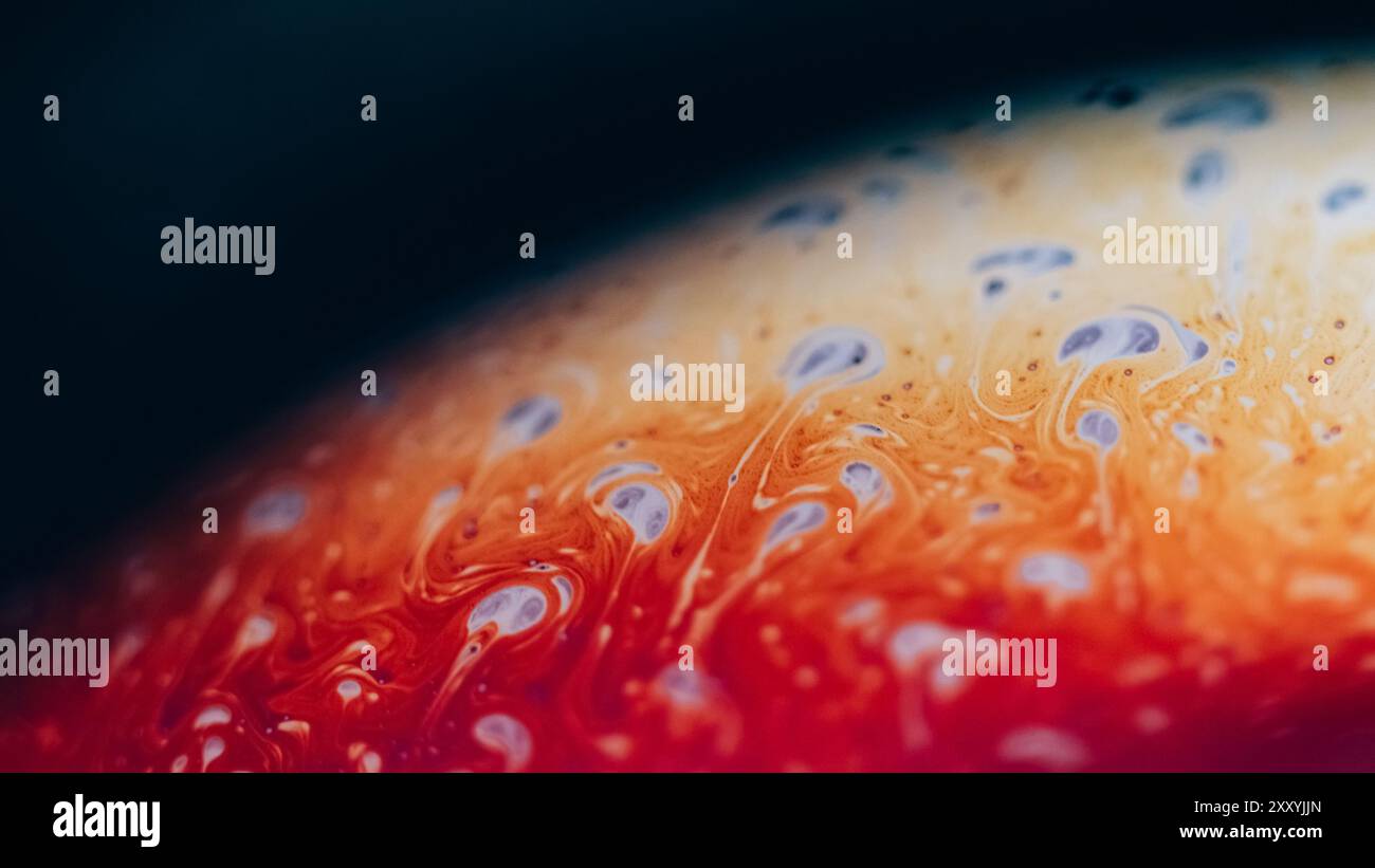 Gasoline rainbow. Paint mix. Defocused neon red orange blue color ...