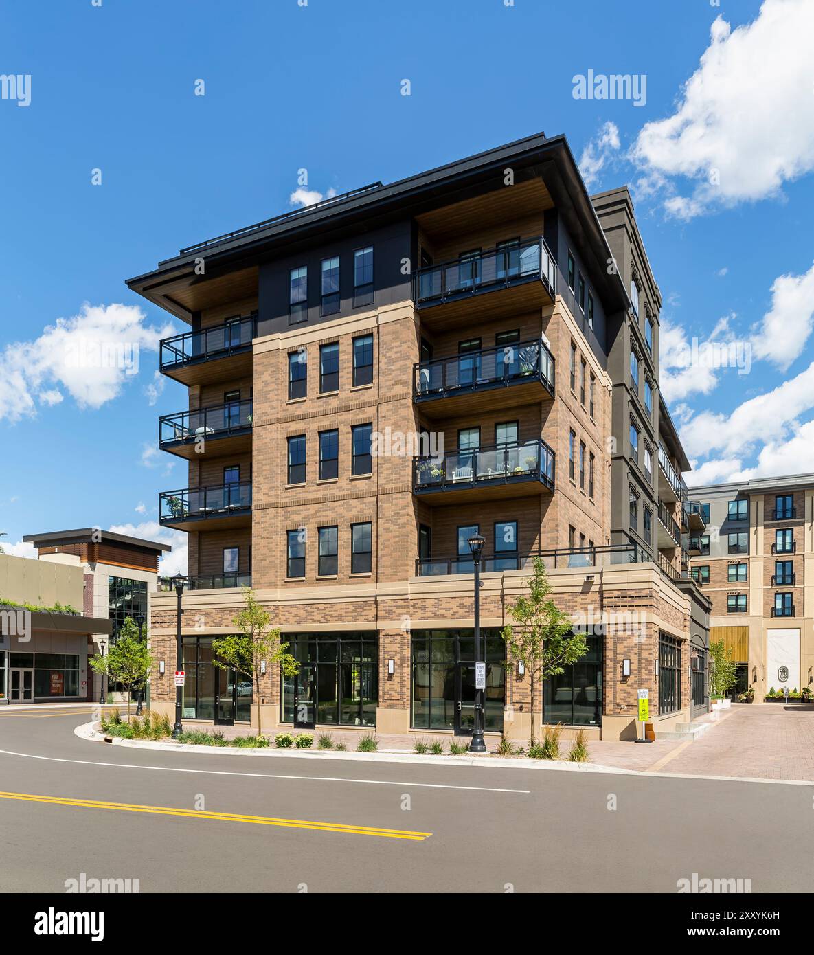 New apartment building that is part of development Stock Photo - Alamy