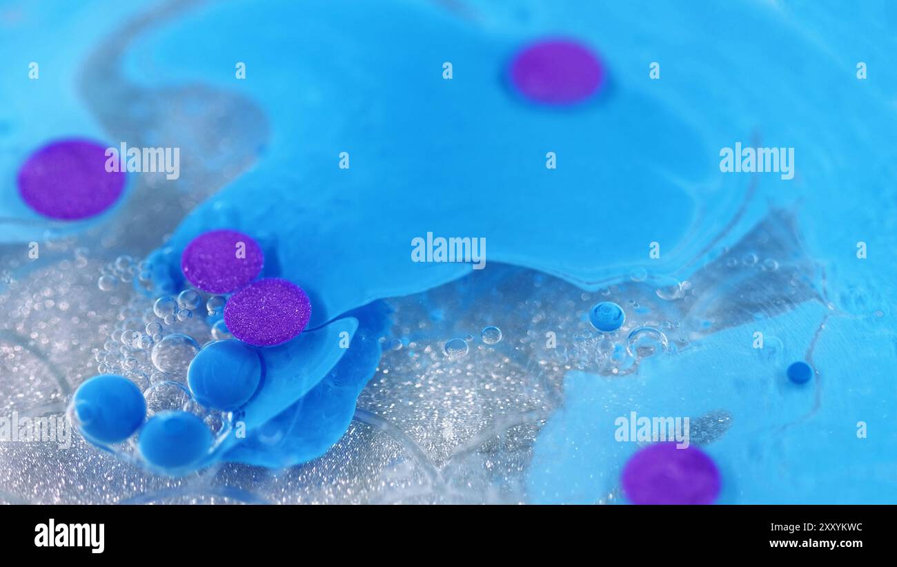 Shimmer drop. Glitter ink. Defocused blue violet silver color floating ...