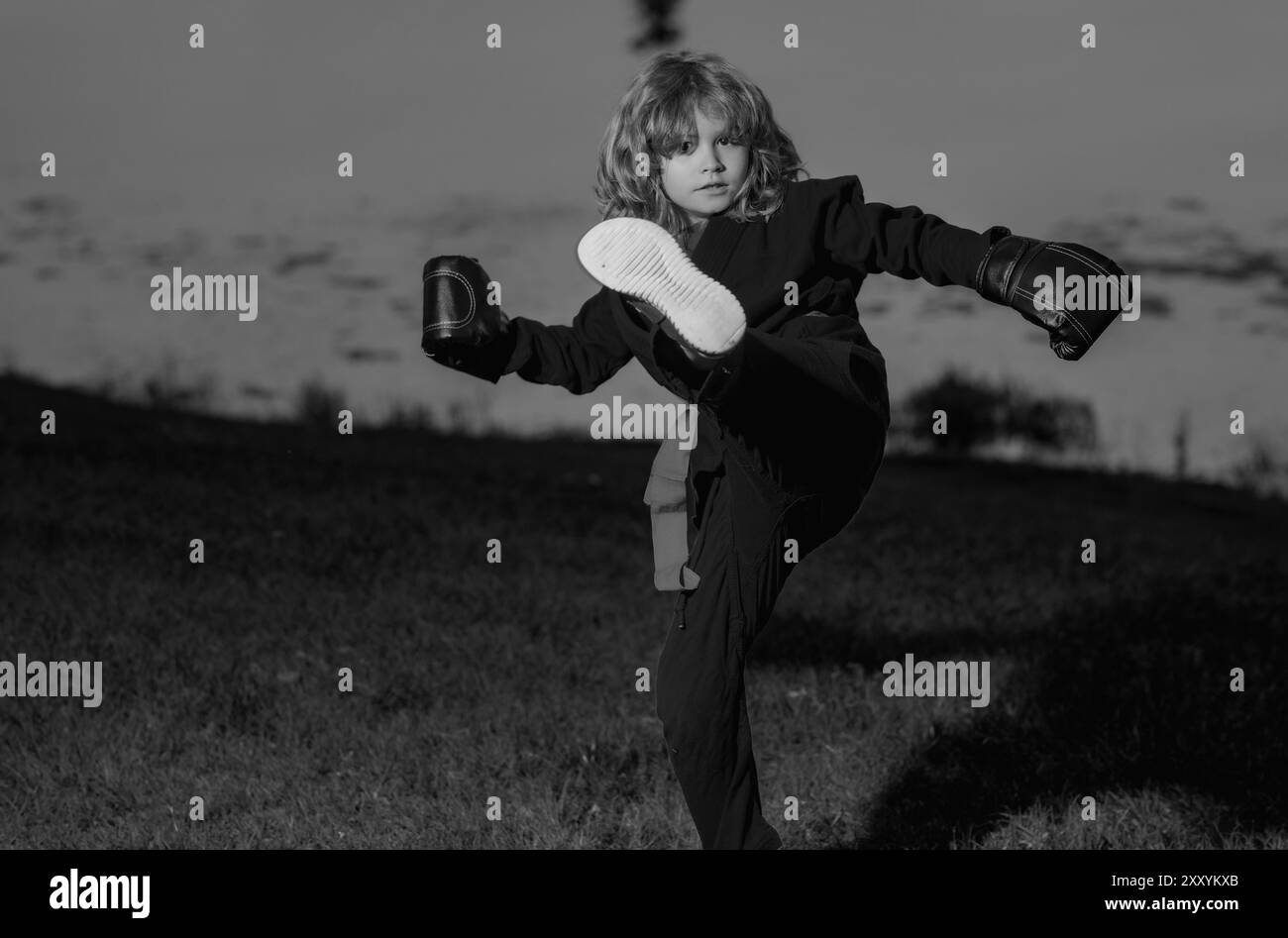 Kid boy practicing box outdoor. Sport karate kids. Little boy in kimono ...