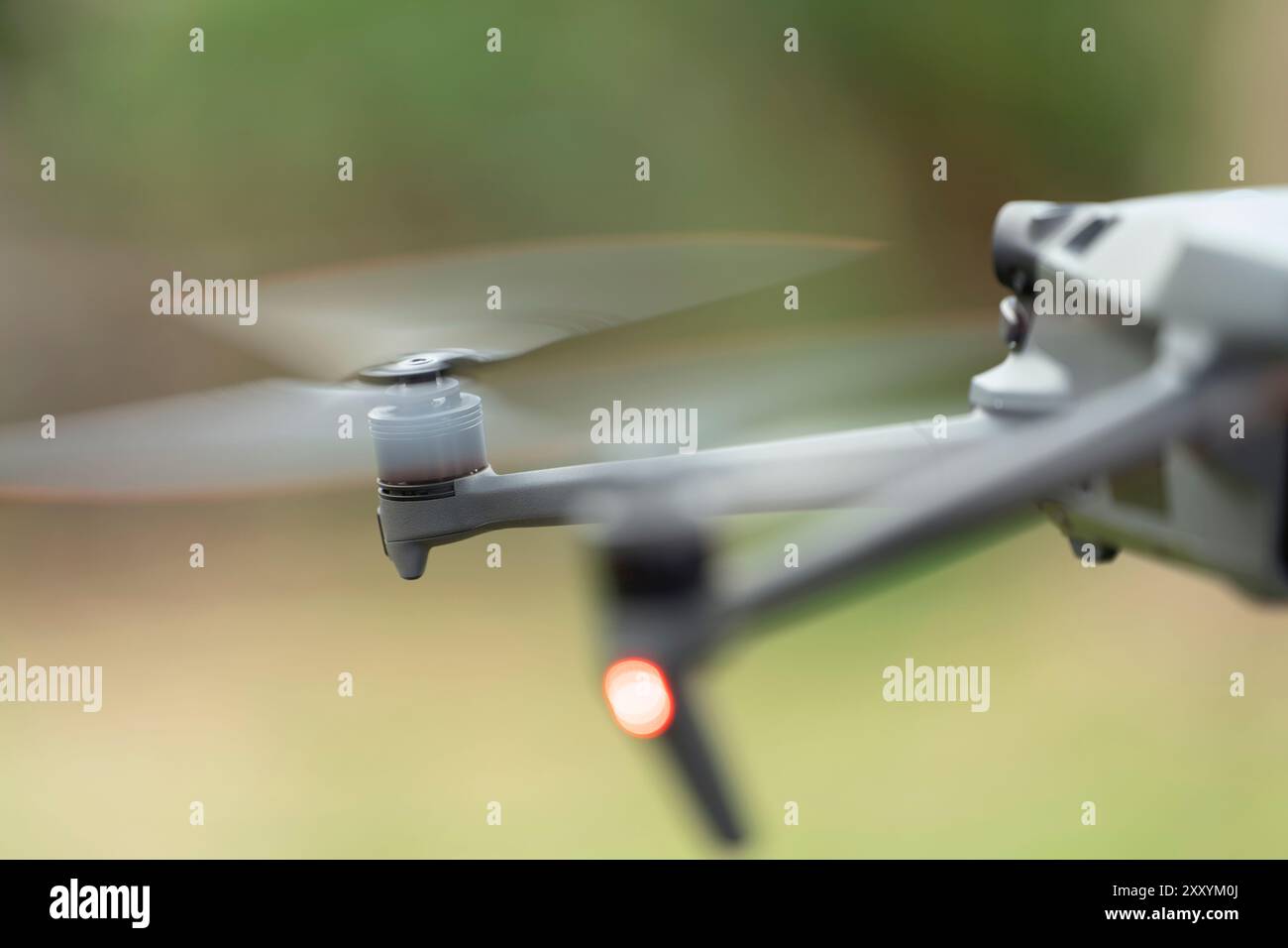 Drone quadcopter with digital camera and fast rotating propellers ...