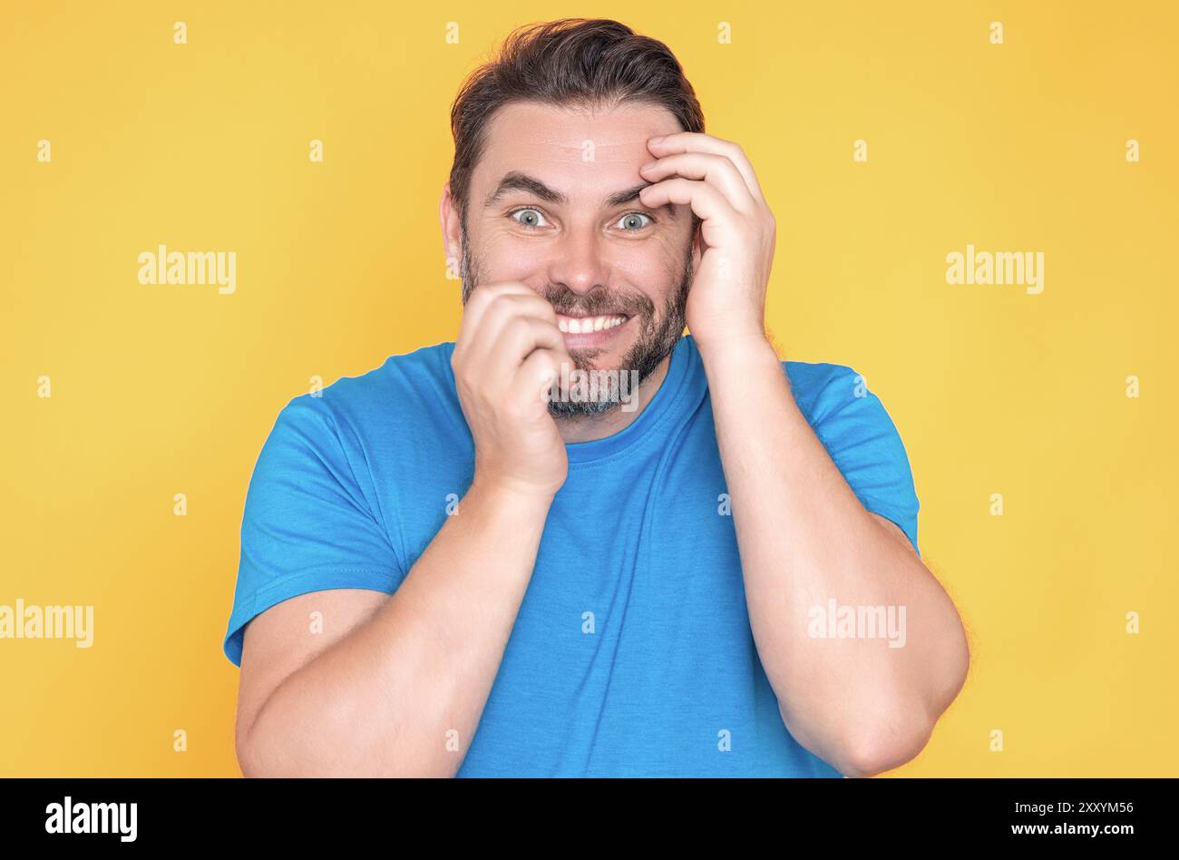 Emotional scared man looks with frightened expression, nervously ...