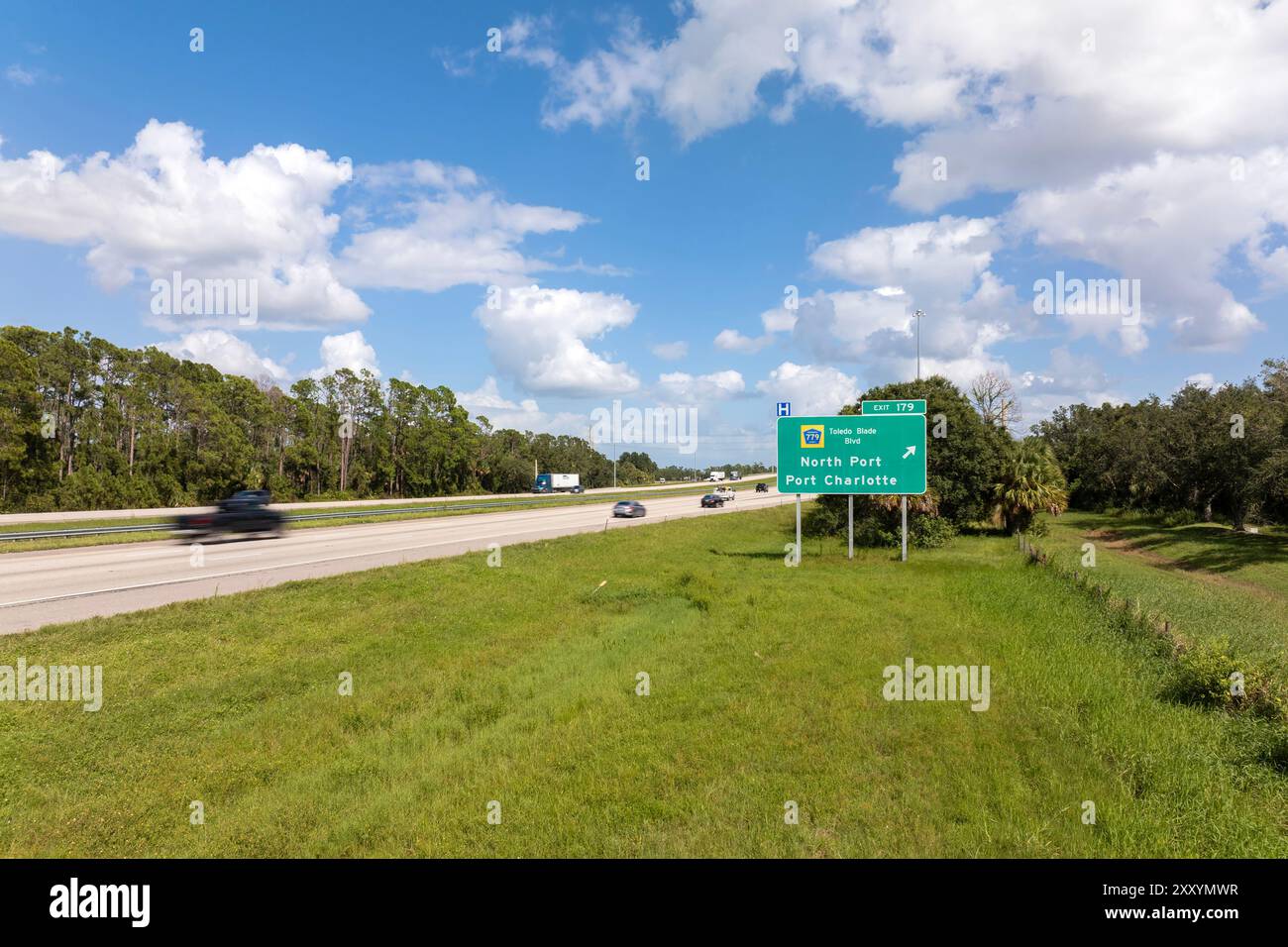 Highway interchange exit sign with direction to North Port and Port ...