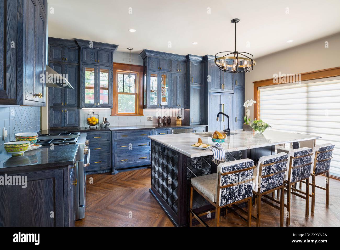 Colorful kitchen with blue stained cabinets and see-through glass ...