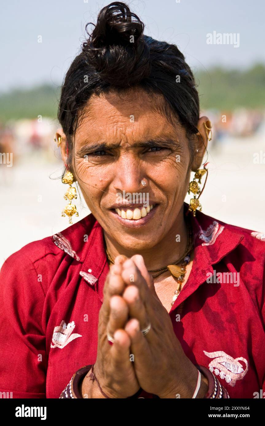 Portrait of a pilgrim at the Gangasagar annual festival in West Bengal ...
